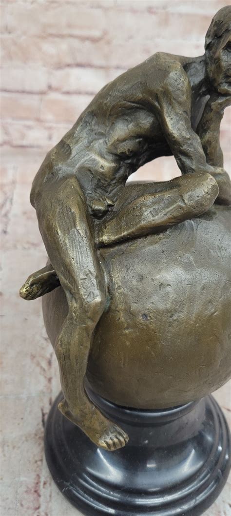 Mario Nick Nude Male Resting On Top Of The World Bronze Sculpture