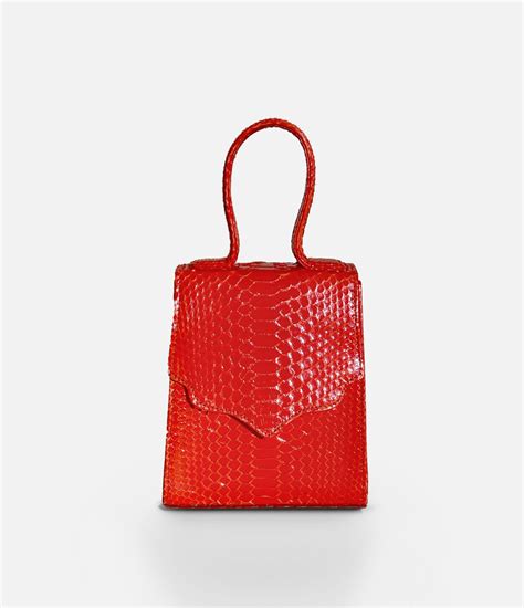 The Mini Missy In Hot Orange Python With Gold Hardware