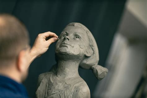 Premium Photo Man Sculptor Creates Sculpt Bust Clay Human Woman