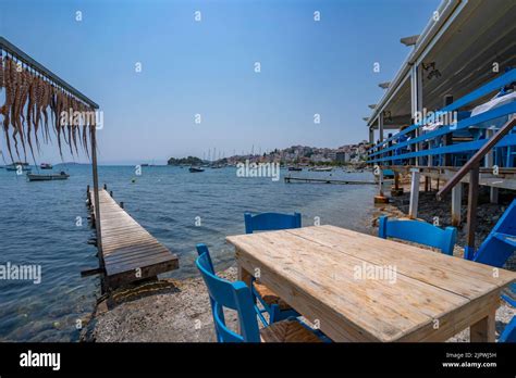 View Of Squid Hanging On A Line At Restaurant In Skiathos Town