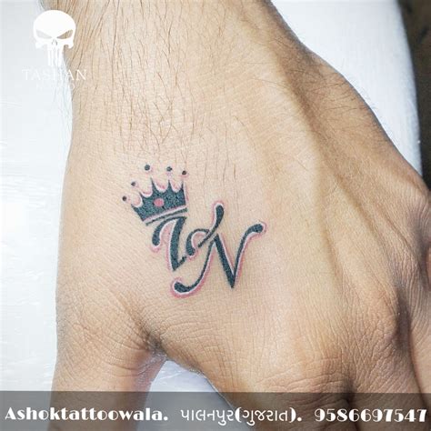 Vn Letter Tattoo Vn Letter Tattoo With Crown On Hand Artofit