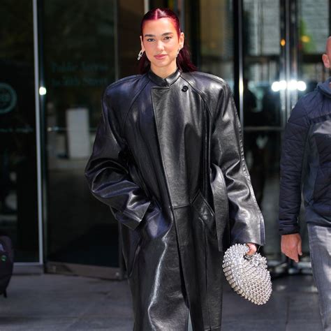 Dua Lipas Knee High Floral Boots Are Fun Flirty And Seriously