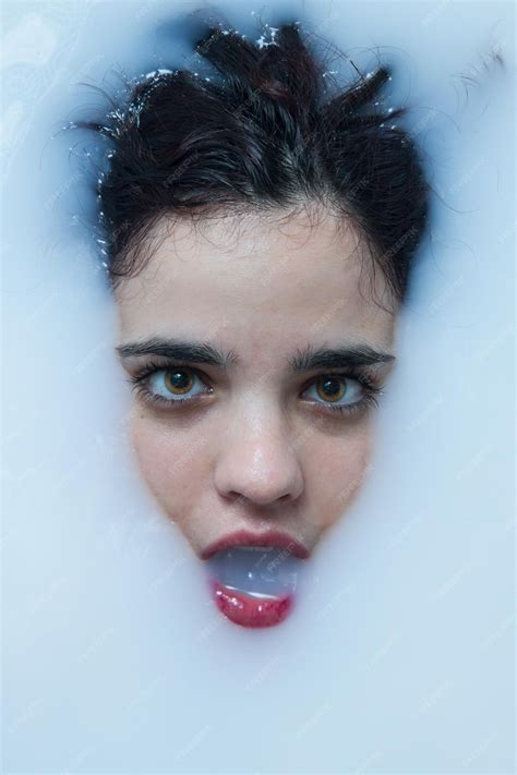 Premium Photo Portrait Of A Young Woman Bathing In White Water