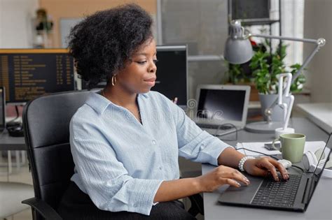 female programmer coding at workplace stock image image of screen