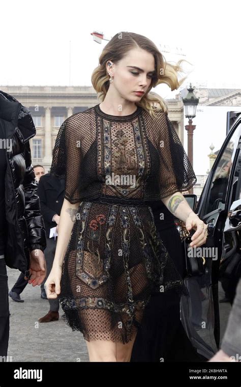 Cara Delevingne Attends The Dior Show During Paris Fashion Week