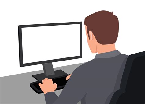 Young Man Working On A Computer View From His Back With Blank Screen