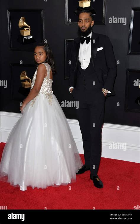 Nipsey Hussle Arrives At The 61st Annual Grammy Awards Red Carpet At