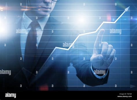 BUsinessman Pressing Virtual Button On Diagram Chart Stock Photo Alamy