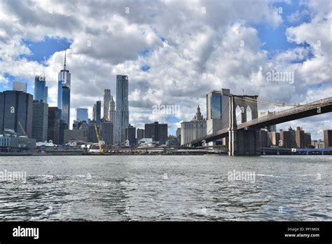 The Iconic Brooklyn Bridge Spanning The East River Between Lower