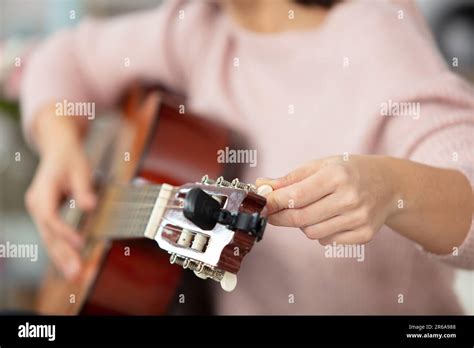 Artisan Fixing Old Classic Guitar Adding A Cord Stock Photo Alamy