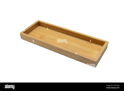 A Close Up Shot Of A Rectangular Bamboo Serving Tray Placed At An Angle