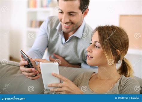 Sharing Data With Electronic Devices Stock Image Image Of Happy