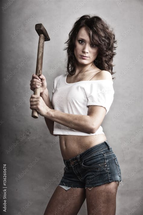 Sexy Girl Repairman Holding Hammer Tool Stock Photo Adobe Stock