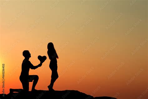 Silhouette Of Attractive Confident Half Naked Man Propose Marriage To