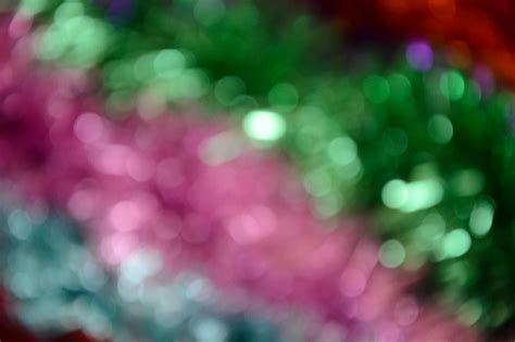 Bokeh 휴일 배경입니다 크리스마스 조명입니다 반짝임 초점이 맞지 않는 반짝임 새해 배경입니다 축제 벽지 깜박입니다 카니발 반짝이 보케 복고풍 스타일 사진입니다 0명에