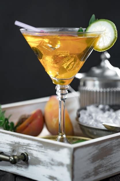 Premium Photo Alcoholic Cocktail With Fruit And Ice