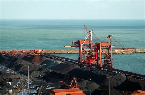 Premium Photo Container Terminal With Cranes At A Commercial Port In