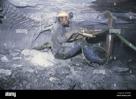 Drilling In An Underground Gold Mine Showing The Cramped Working Stock