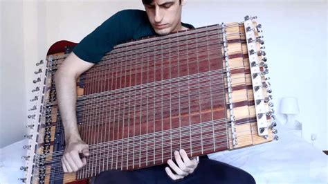 Musician Plays Solo On Enormous 69 String Bass