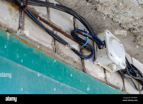 Junction Box For Wiring With Electrical Cables On The Wall Wires In