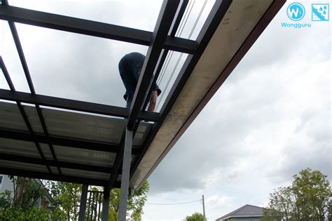 หลังคาเมทัลชีท Bluescope Colorbond ซ่อนรางน้ำฝนสแตนเลส กับงานหลังคาโรงรถสไตล์โมเดิร์น Wongguru