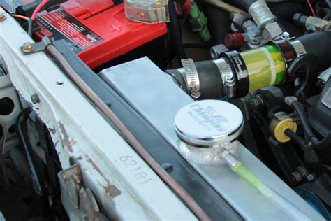 An Inline Coolant Filter Will Catch What You Dont See Beyond The Checkered Flag