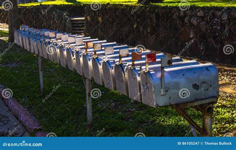 Row Of Metal Mailboxes With Flags Up Stock Image Image Of Postbox