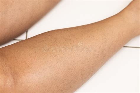 Close Unshaven Hairy Woman Outstretched Legs On White Tile Sensitive