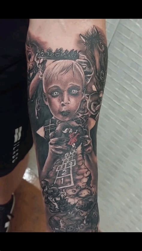Korn Eyelid Tattoos