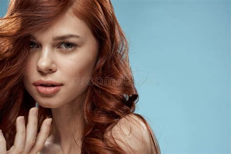 Beautiful Woman Curly Long Hair Smooth Hairstyle Naked Shoulders Cosmetics Care Blue Background