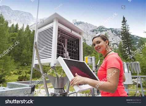 Pretty Woman Meteorologist Reading Meteodata Instruments Stock Photo 692156212 Shutterstock