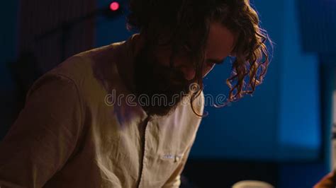 Musician Composer Playing Midi Controller Synthesizer In Professional