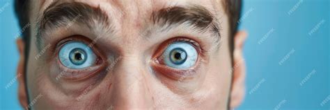 Premium Photo Surprised Male With Bulging Eyes In Closeup