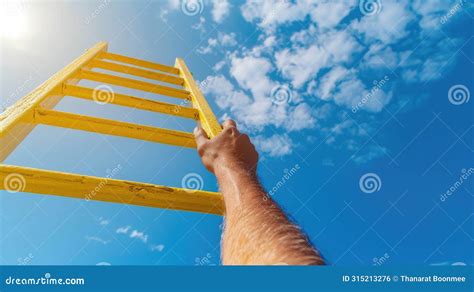 A Symbolic Illustration Of Ambition And Career Progression A Hand