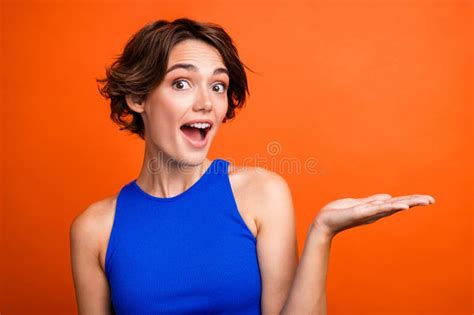 Photo Of Impressed Funky Girl Dressed Blue Top Open Mouth Showing Arm