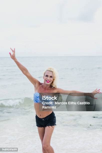 Portrait Of Young Transgender Woman At The Beach In Mexico Latin