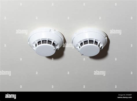 White Ceiling Mounted Smoke Detectors For Fire Safety And Protection Essential Security