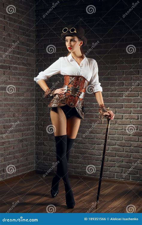 Portrait Of A Beautiful Steampunk Girl In Lingerie And Stockings Hat