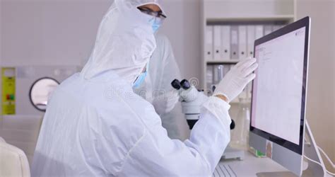 Medical Research And Covid Science Team Doing Analysis A Sample Using