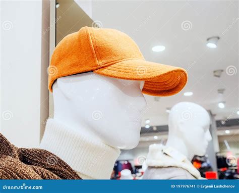 Head Of A White Male Mannequin Wearing A Red Cap Stock Image Image Of