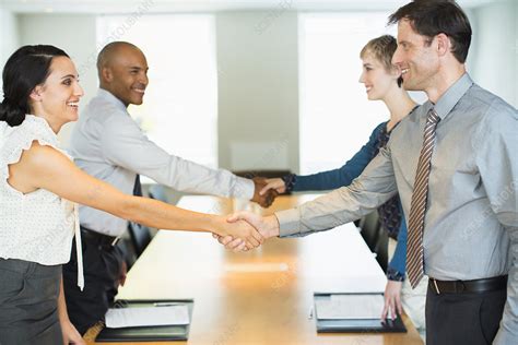 Business People Shaking Hands In Meeting Stock Image F0143065