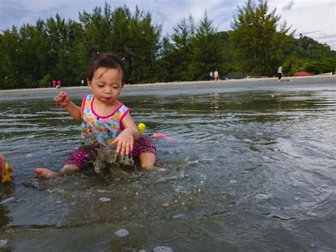 Premium Photo Cute Girl Enjoying In Water