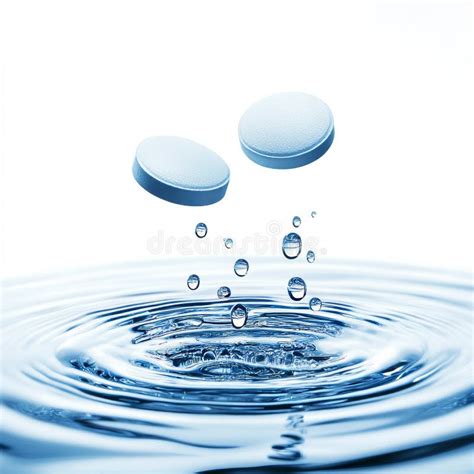 Cutout Of Effervescent Tablets Dissolving In Water With Bubbles Stock