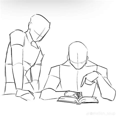 Two People Sitting At A Table With An Open Book In Front Of Them One