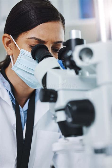 Science Laboratory And Woman With Microscope For Medical Analysis Research And Lab Test
