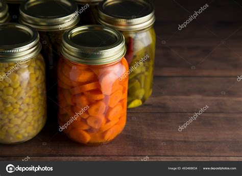 Various Types Canned Vegetables Wooden Table Dark Environment — Stock