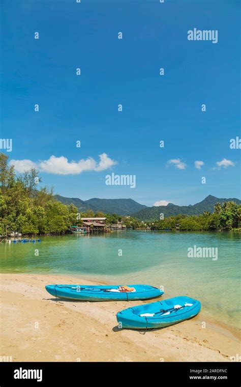 White Sandy Beach With Two Kayaks Hi Res Stock Photography And Images