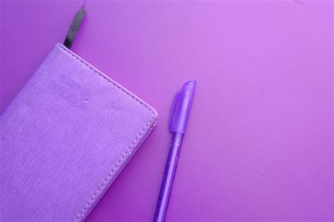 Premium Photo Magenta Color Notepad And Pen