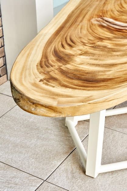 Premium Photo Dining Table Made Of Large Lacquered Live Edge Suar