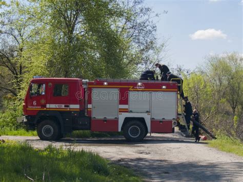 Red Fire Truck Fetching Water From The River Editorial Photo Image Of